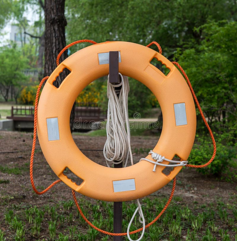 Life Ring / Orange Life Preserver Stock Photo - Image of security ...