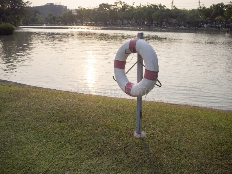 Life Ring , Preserver on Pole in Park when Sunset Stock Photo - Image ...