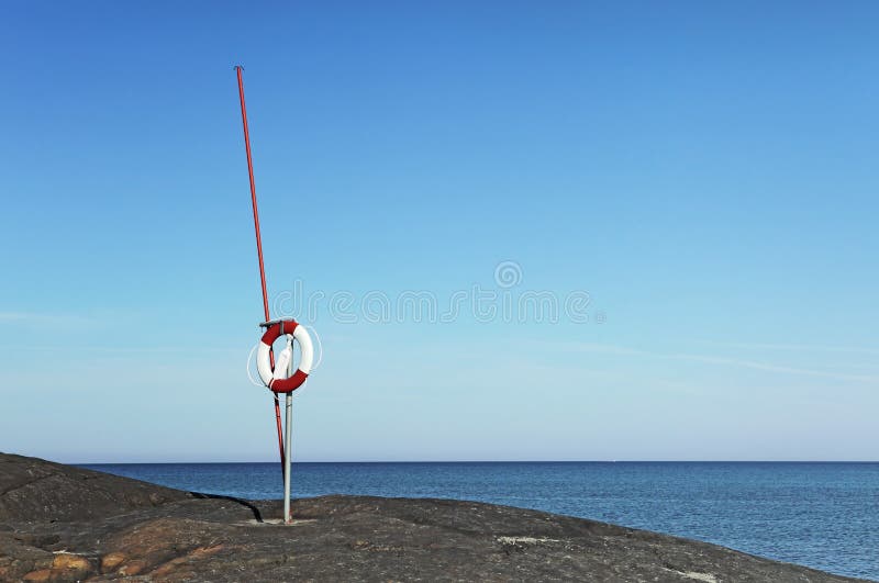 Life-saving Tools on a Cliff by the Sea Stock Photo - Image of gear ...