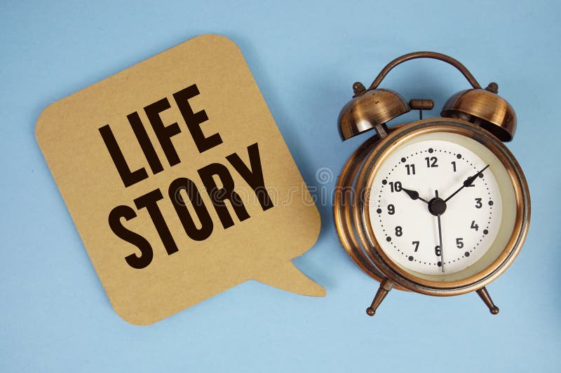 Life Story Text with Alarm Clock on Blue Background Stock Image - Image ...