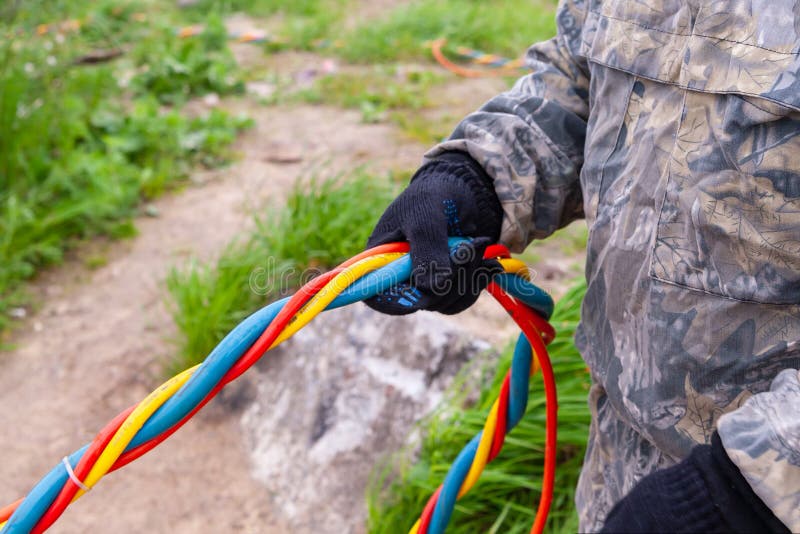 Life Support Hoses Diver in the Hands of an Assistant on the Shore ...