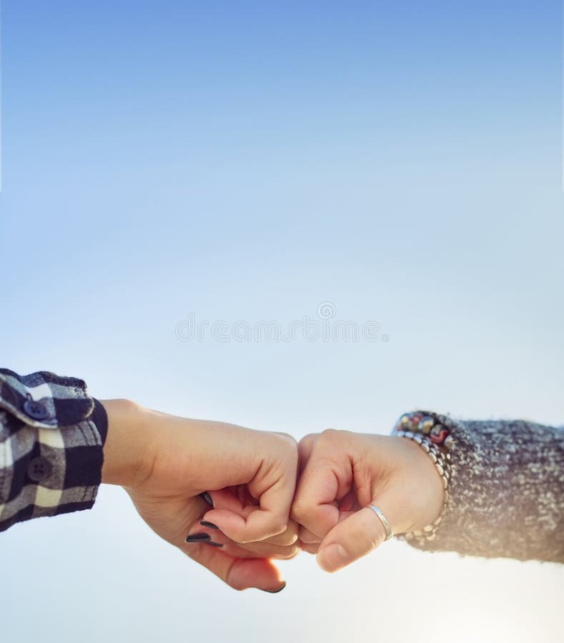 For Life. Two Unrecognizable Women Fist Bumping Outdoors. Stock Photo ...