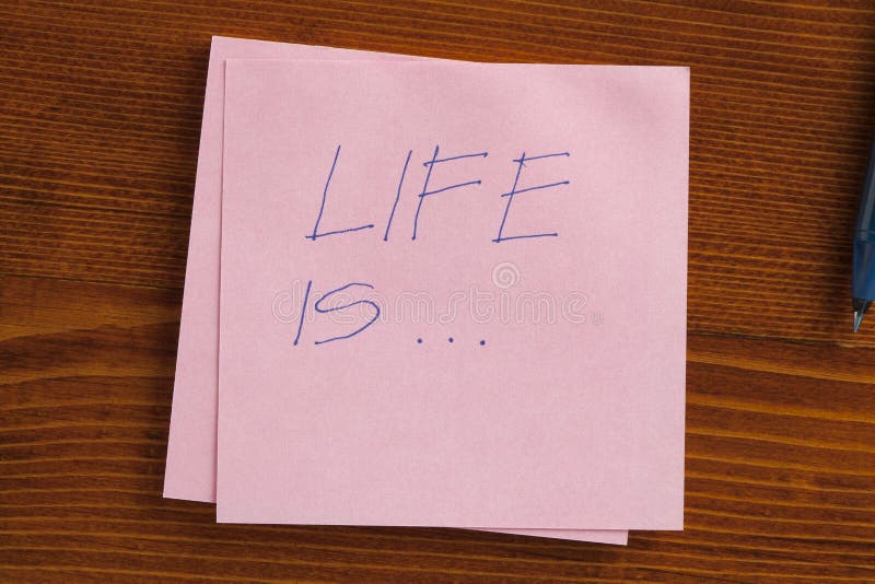 Life is written on a note stock photo. Image of mind - 93702682
