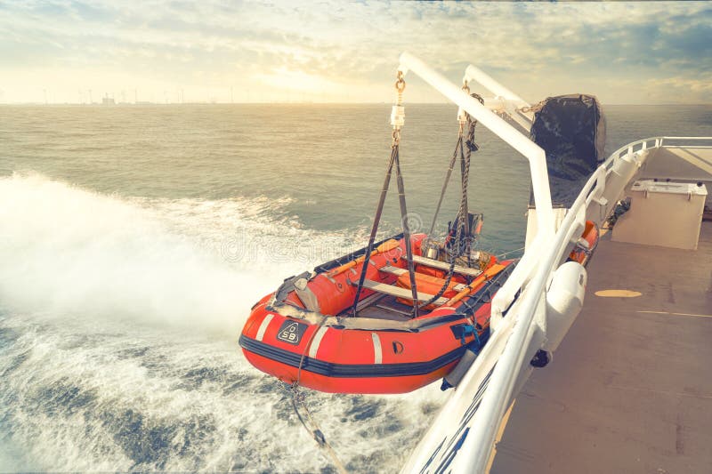Lifeboat at the Back of a Boat Editorial Stock Photo - Image of water ...