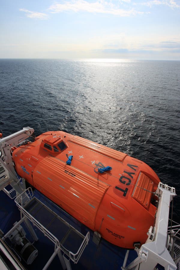 Lifeboat on a Ferry, Deep Blue Sea Stock Image - Image of lifesaver ...