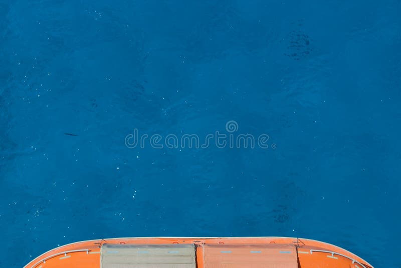 Lifeboat Over Deep Blue Waters Stock Photo - Image of bright, boat ...