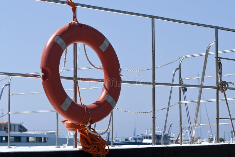 Lifebuoy on boat railings stock photo. Image of seafront - 190589254