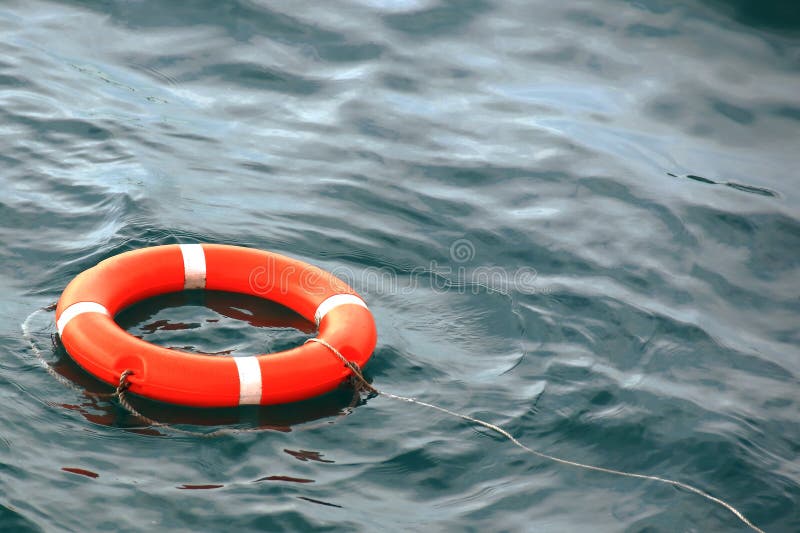 Lifebuoy Orange Floats on Water Stock Photo - Image of ready, help ...