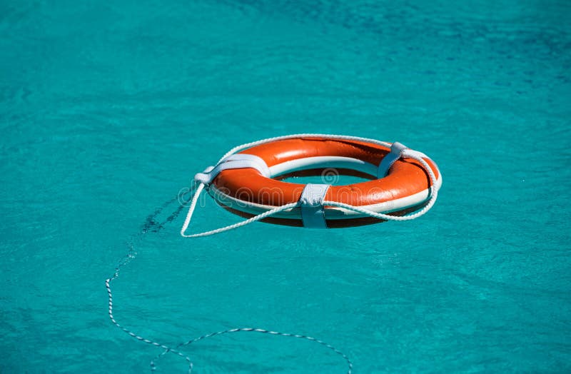 Lifebuoy Pool Ring Float on Blue Water. Stock Image - Image of aqua ...