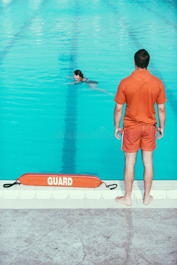 Lifeguard Doing Resuscitation Procedure Stock Photo - Image of people ...