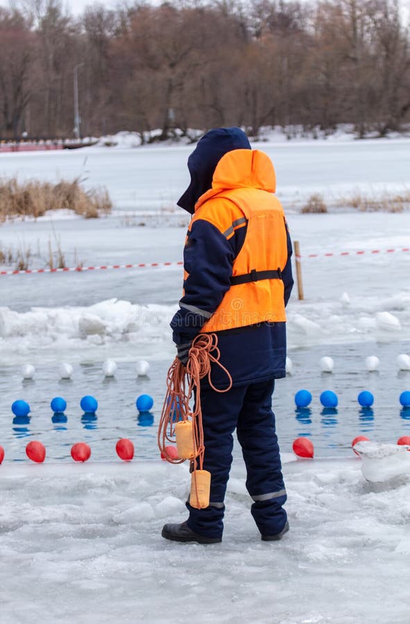 Lifeguard on the Ice of the Lake Stock Image - Image of cold, strength ...