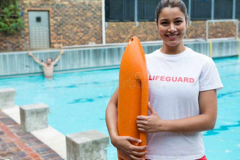 Lifeguard Standing in the Sand. Lifeguard Float Stock Photo - Image of ...