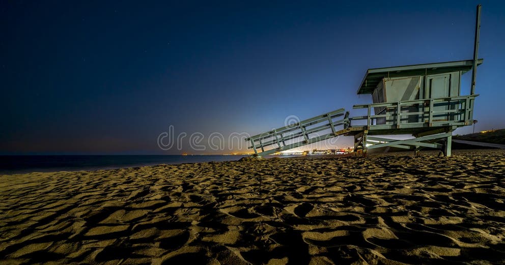 Night Time Photograph of a Life Guard Tower on the Beach Stock Photo ...