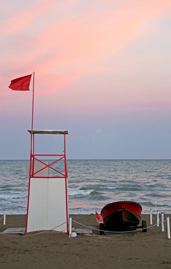 Lifeguard Tower with Red Flag at the Seaside Stock Image - Image of ...