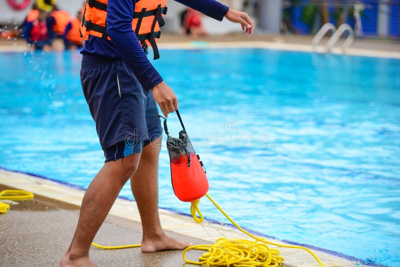 Lifeguard Training with Rescue Dummy in a Pool Stock Photo - Image of ...