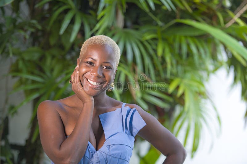 Lifestyle Portrait Of Young Attractive And Joyful Black African