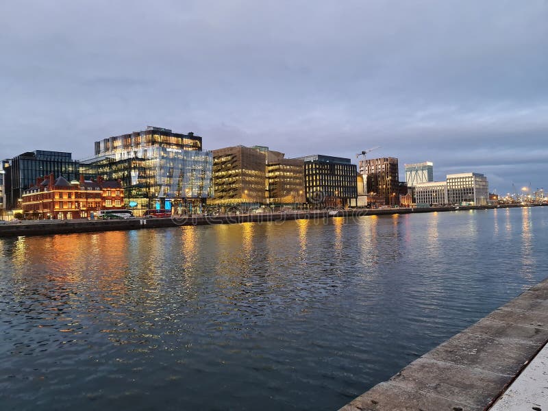 Liffey River and Modern Offices at Sunset, Dublin Ireland Stock Photo ...