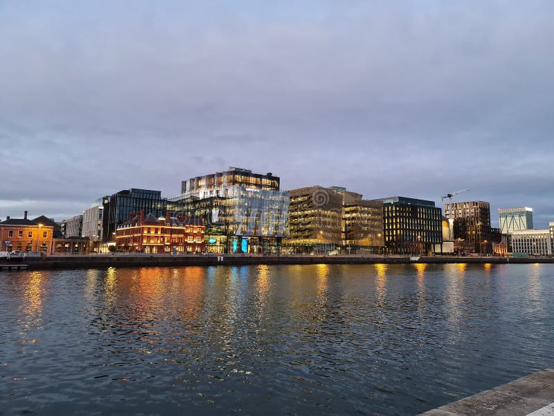 Liffey River and Modern Offices at Sunset, Dublin Ireland Stock Image ...