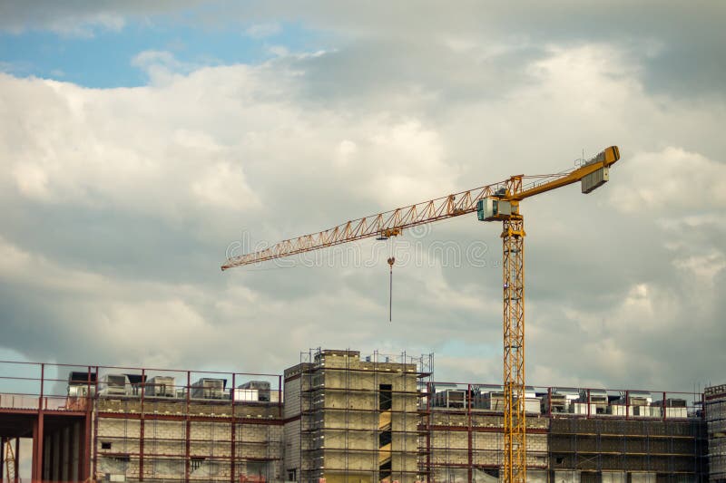 Lift Crane Over Construction Building Stock Image - Image of housing ...