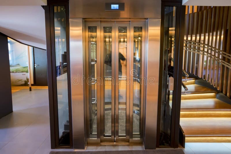 Lift with Transparent Glass Doors in Modern Building Stock Photo ...