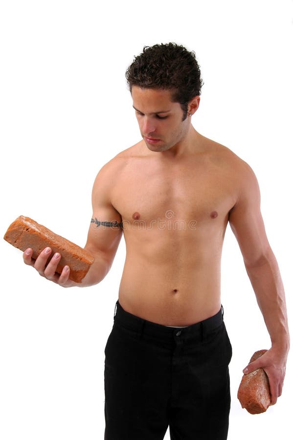 Lifting Bricks stock photo. Image of torso, naked, muscular - 1074280