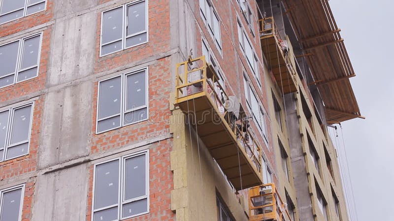 Lifting Bricks Construction of New Modern Skyscraper or Living Building ...