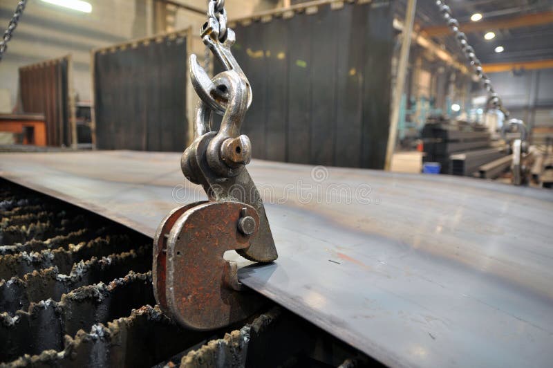 Lifting Chains and Hooks for Loading Sheet Metal Stock Photo - Image of ...