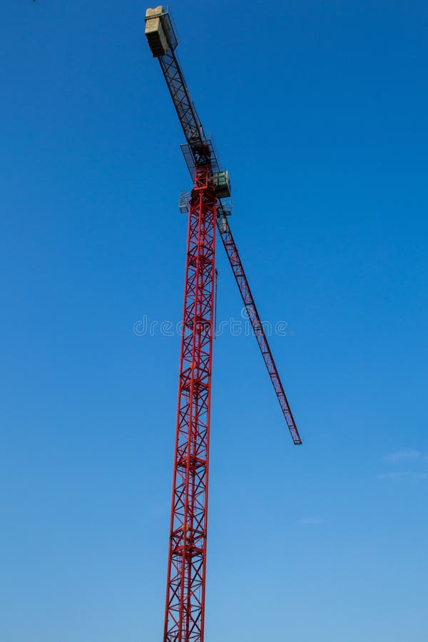 Lifting Crane on the Background of a Blue Sky Editorial Stock Photo ...