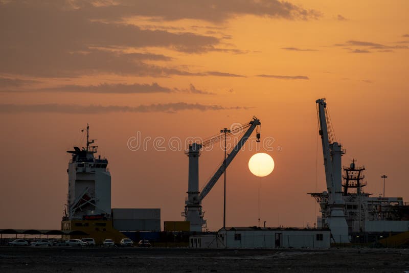 Lifting Crane Mounted on Cargo Ship during Sunset Editorial Image ...