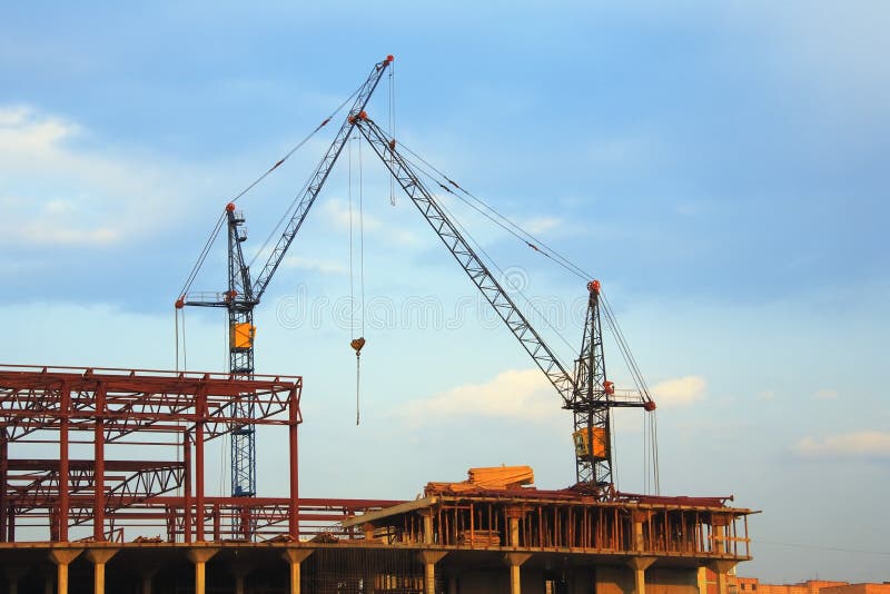 Big Crane and Building Construction Against Beautiful Dusky Sky Stock ...