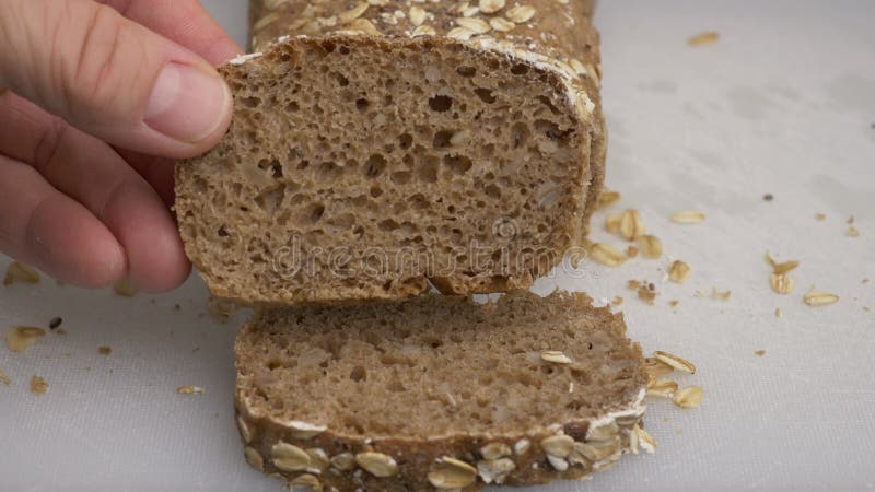 Lifting the Cut Slice of Bread and Showing Its Crumb Stock Video ...