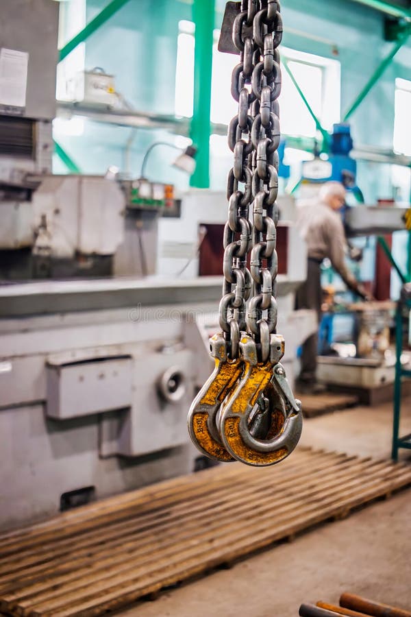 Lifting Device with Heavy Hooks Ready for Use in an Industrial Workshop ...
