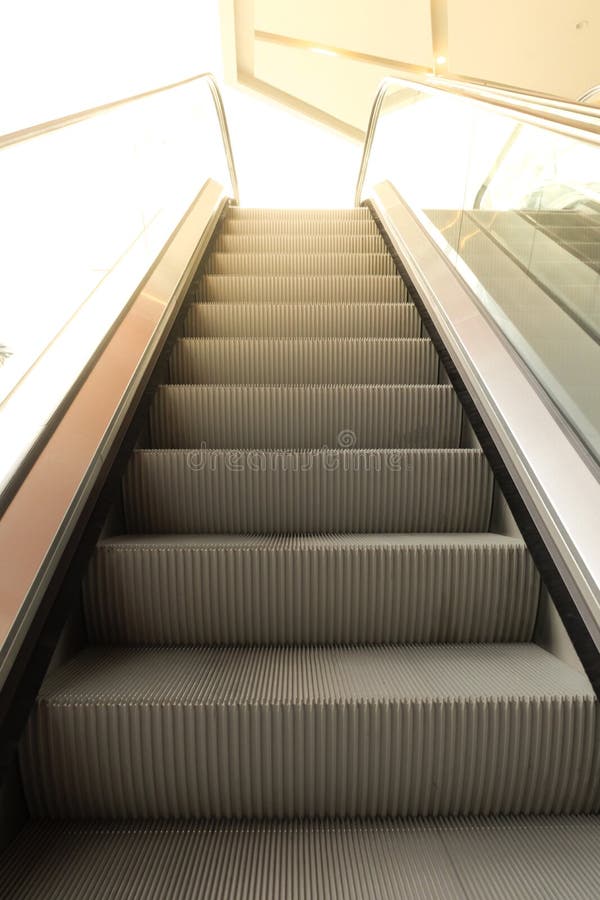 Lifting escalator stock photo. Image of floor, business - 91642948