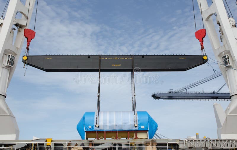 Lifting Heavy Equipment on Ships. Stock Image - Image of cranes, ocean ...