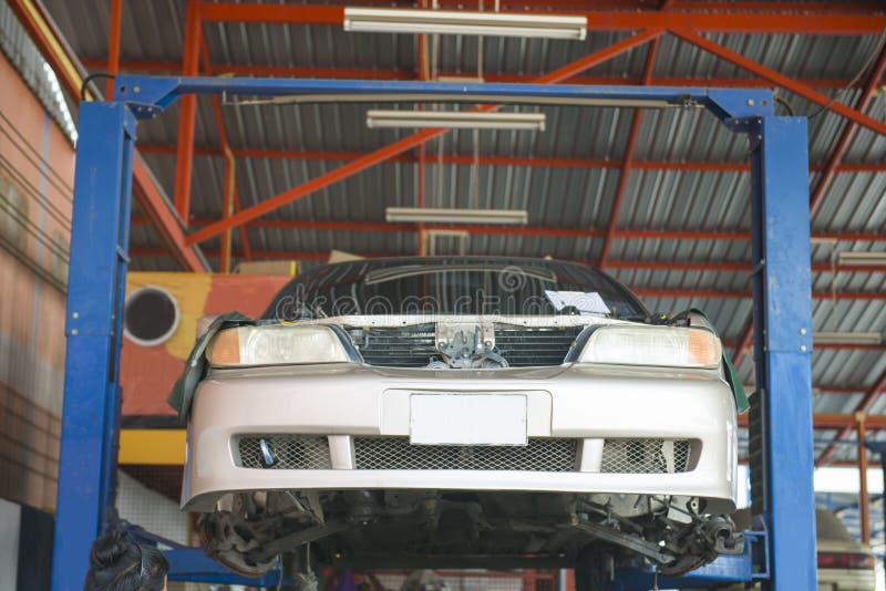 Lifting Machine Lift Up a Broken Car for Fix Stock Image - Image of ...