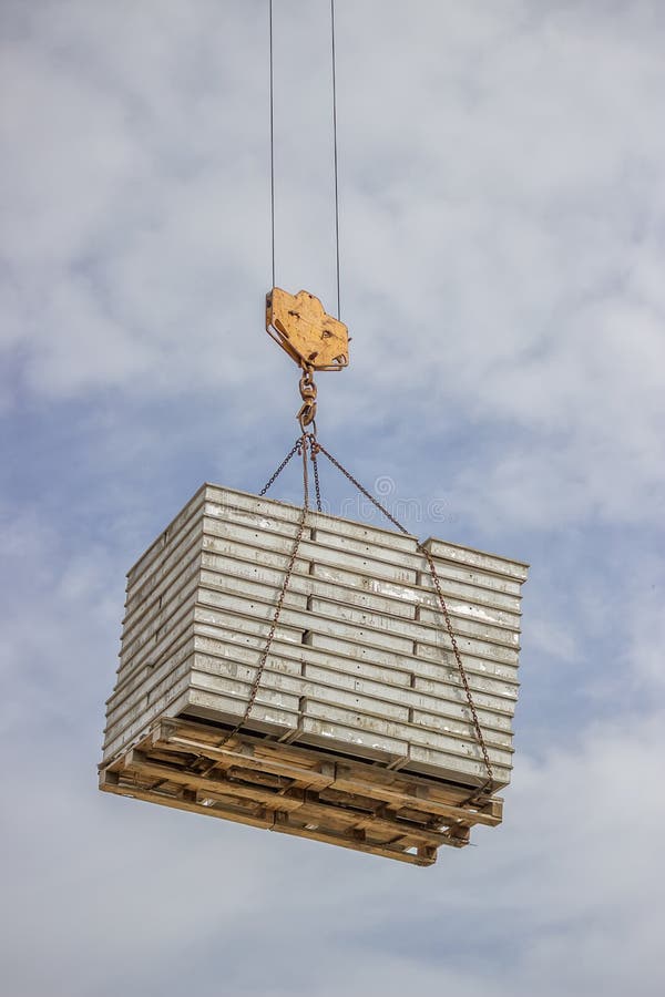 Lifting Pallet with Formwork Elements by Crane 2 Stock Image - Image of ...
