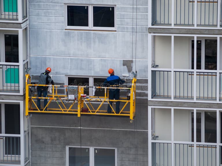 Lifting Platform for Construction Workers Working on the Facade of a ...