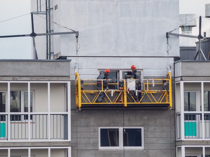 Lifting Platform for Construction Workers Working on the Facade of a ...