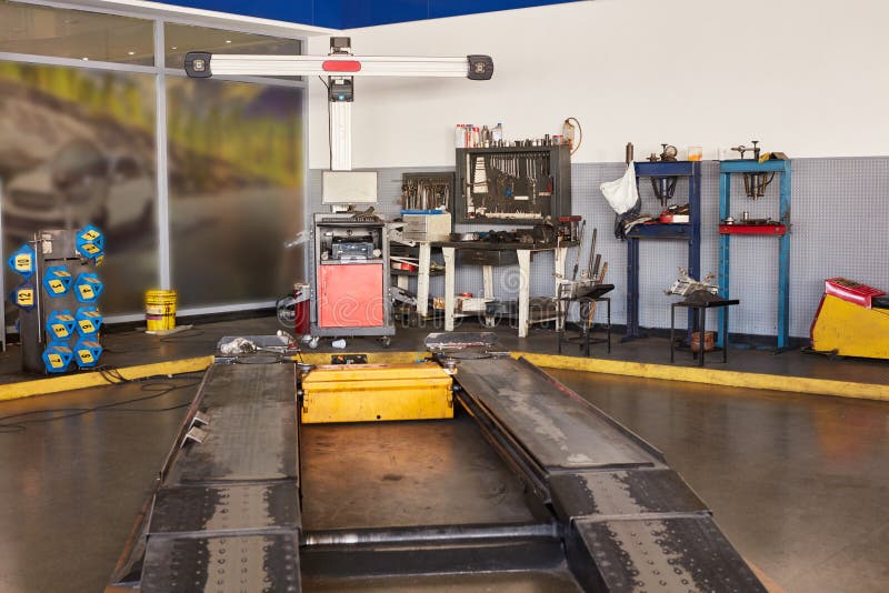 Lifting Platform and Other Equipment in a Car Workshop Stock Image ...