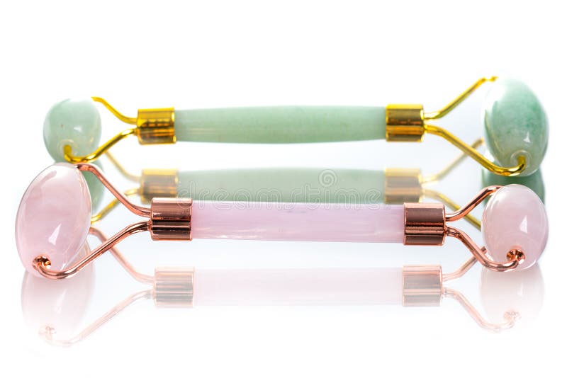 Green Gua Sha Massage Jade and Pink Face Roller Stock Photo - Image of ...