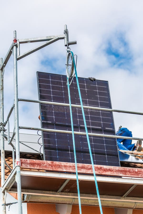 Installing Solar Panels on a Roof. Solar Panels on Roof Stock Image ...