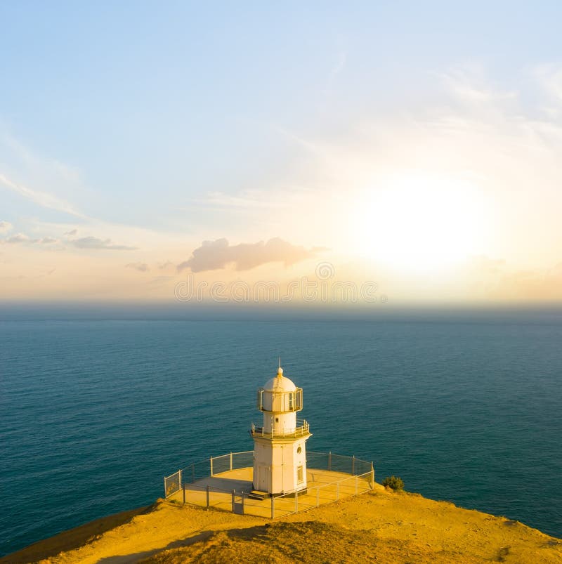 Lighhouse on Marine Cape at the Sunset Stock Image - Image of building ...