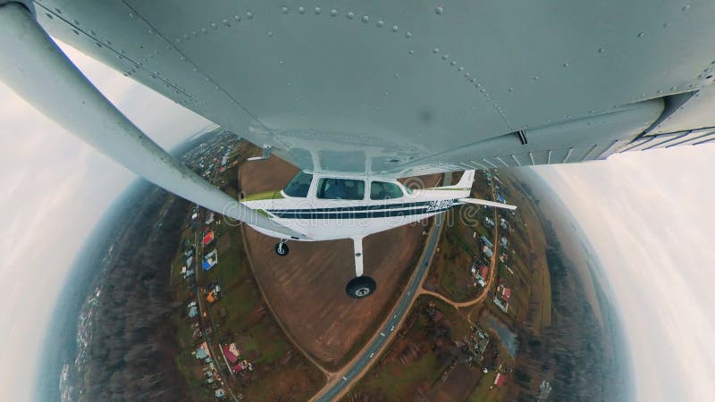 Light Aircraft Flying Over Skyscrapers at Sunset. Urban Scene ...
