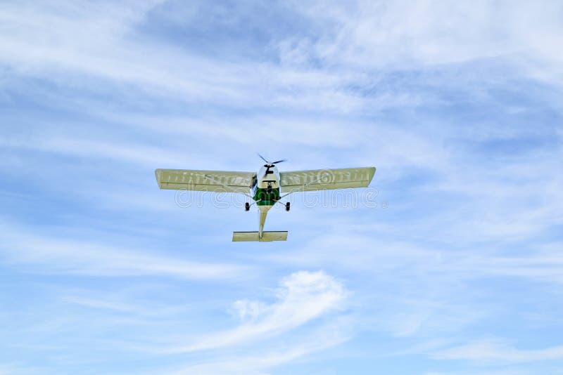 Light Aircraft Flying Over Blue Sky. Single-engine Stock Image - Image ...