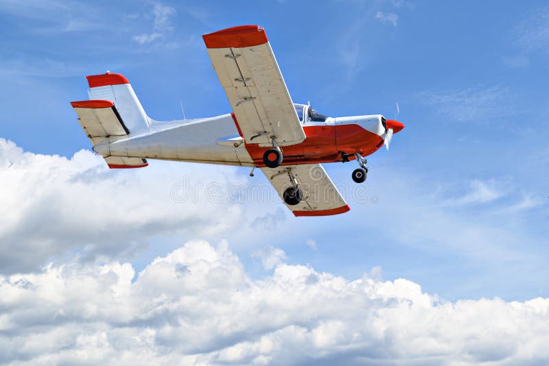 Light Aircraft Flying Over Blue Sky Stock Image - Image of flight ...