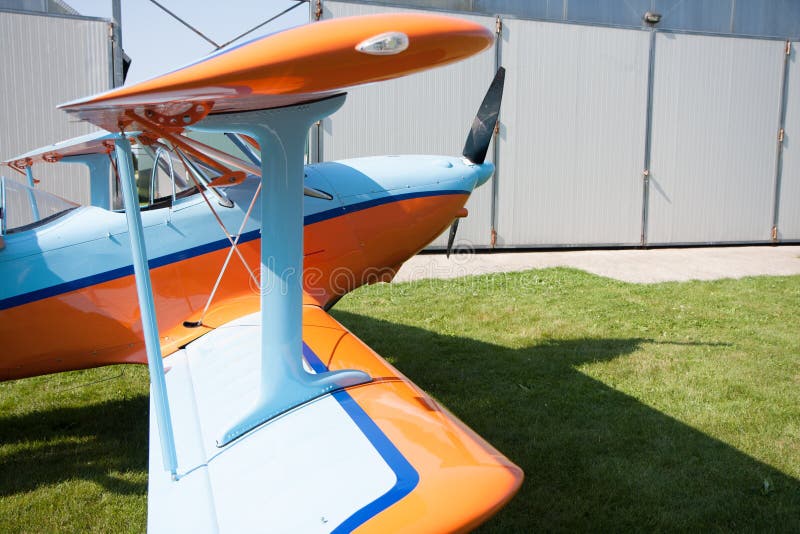 Light Aircraft, Modern Biplane Orange and Blue Stock Image - Image of ...