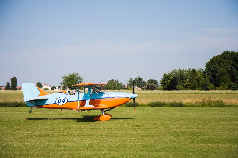 Light Aircraft, Modern Biplane Orange and Blue Stock Image - Image of ...