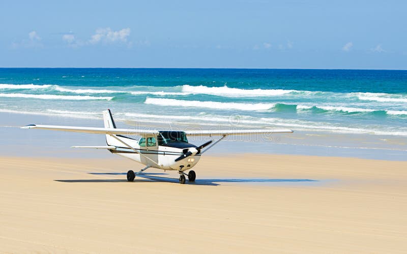 Aircraft on the Beach of Fraser Island Stock Photo - Image of clouds ...
