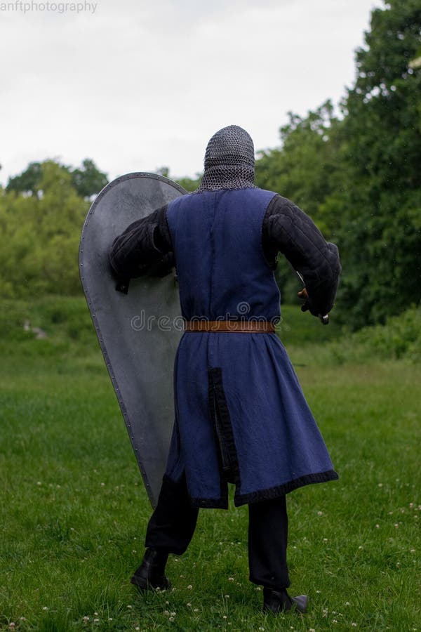 Light Armor Knights Standing Backwards, Shield in Hand Stock Image ...