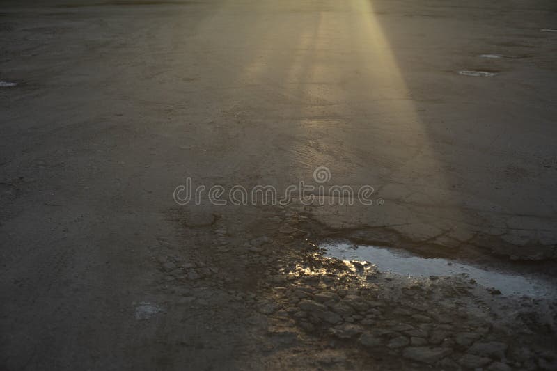 Light on the Asphalt. Rays of Light on the Road Stock Photo - Image of ...